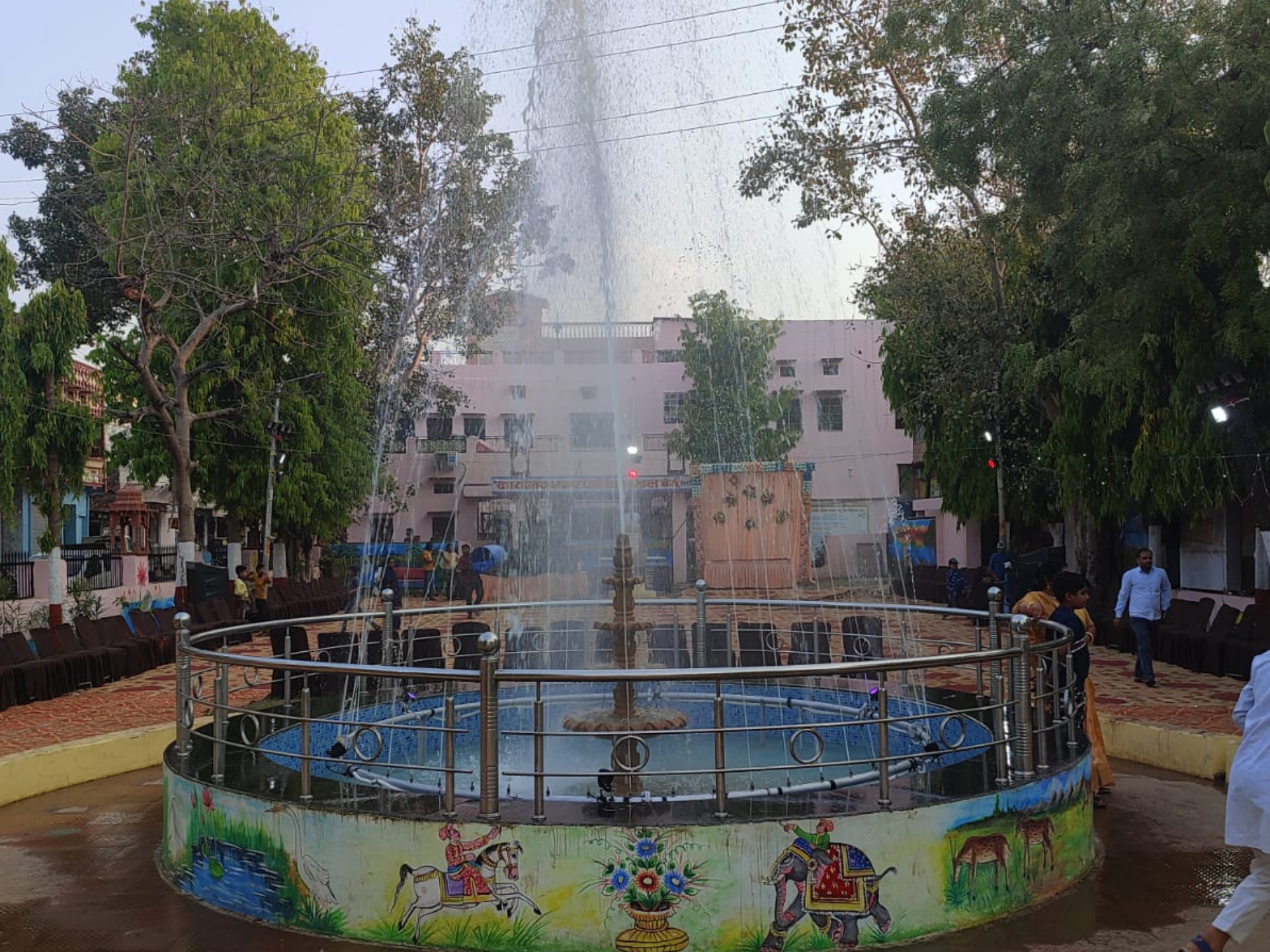 After the installation of fountains, swings and grass, the face of ...