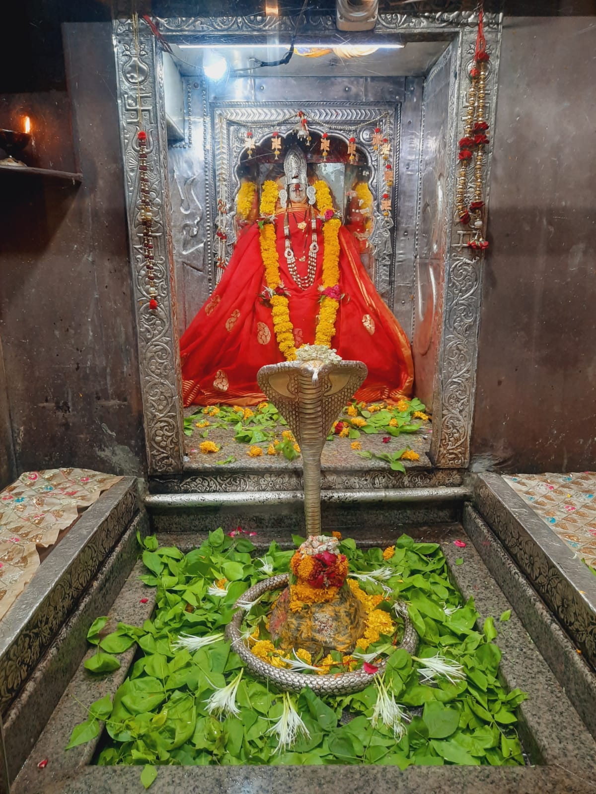 Onkar ji was adorned with marigold flowers, belpatra, do… Mangala Aarti ...