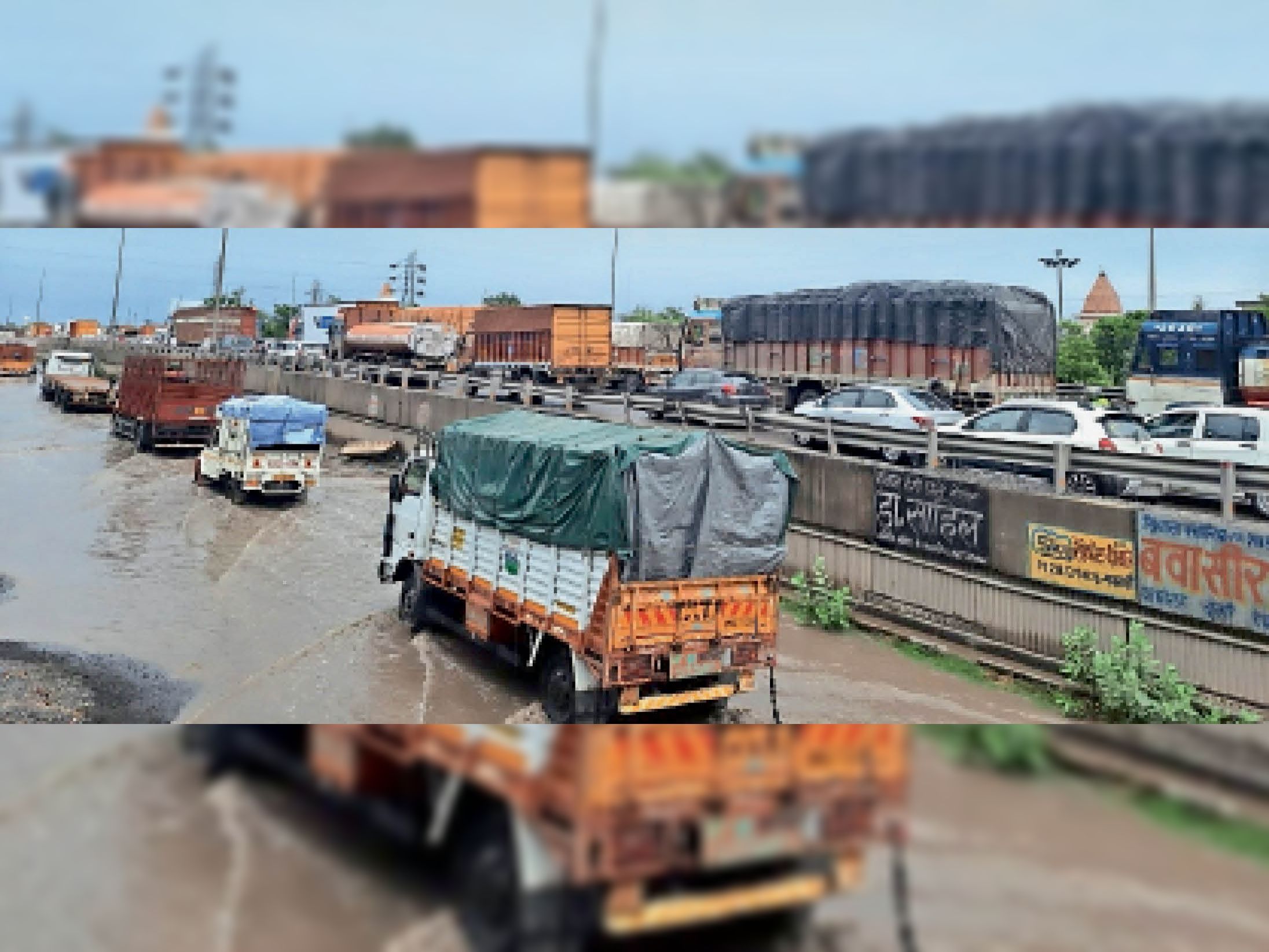 Highway jammed in rain, 10 km from Kapriwas to Masani. vehicles stuck ...