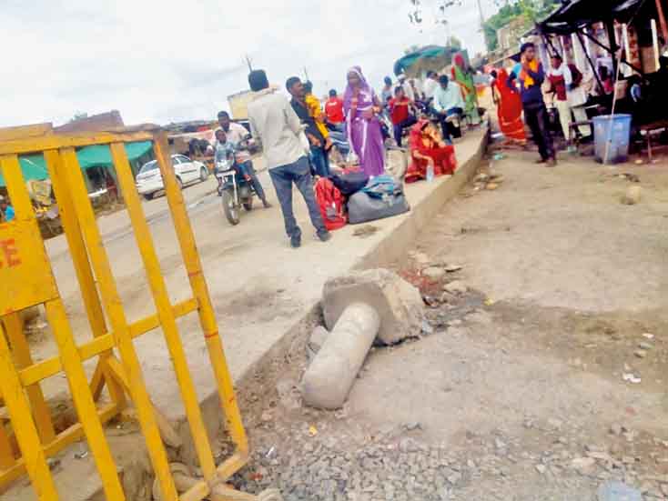 Bus stand not built yet, buses standing on the roads, no provision for ...