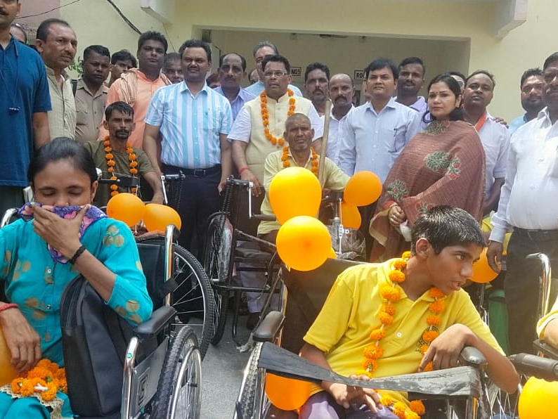 Tricycle, wheel chair and crutches distributed to Divyangjan, meeting ...