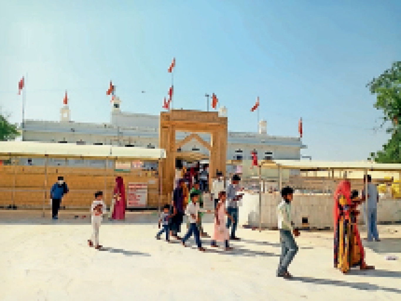 Devotees queue up for darshan in the temple from morning till evening ...