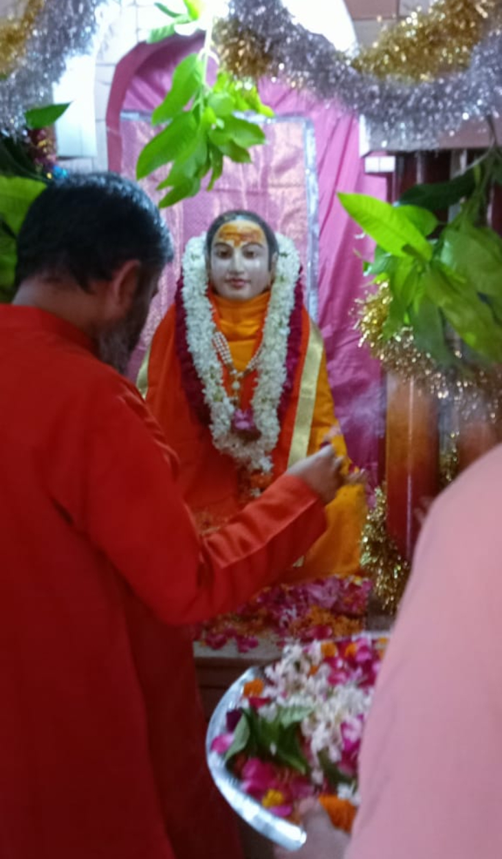 Worship, Abhishek and Maha Aarti were done to the idol of Lord Srichand ...