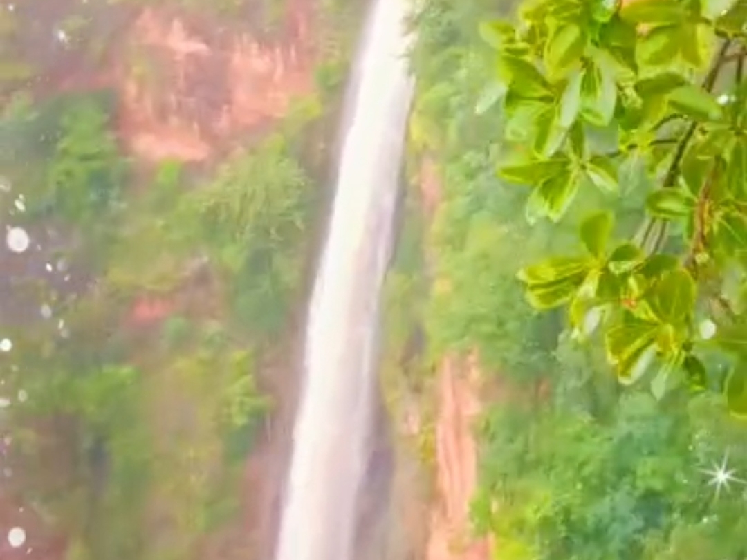 Milky edge falling from 107 meters of Silver Fall, B-fall attracting ...