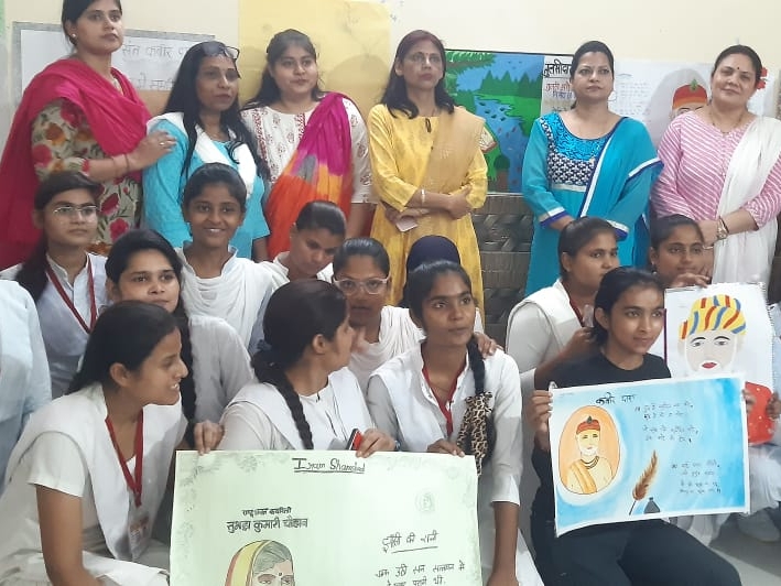 Students put ideas through poster slogans, started lighting a lamp in ...