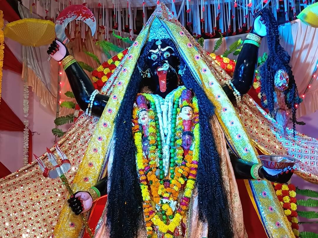 Sculptor engaged in finalizing the statues, the court of Maa Kali is ...