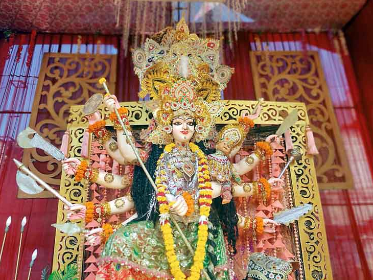 Four feet crown on 7 feet statue, Dandiya dance ... also giving martial ...