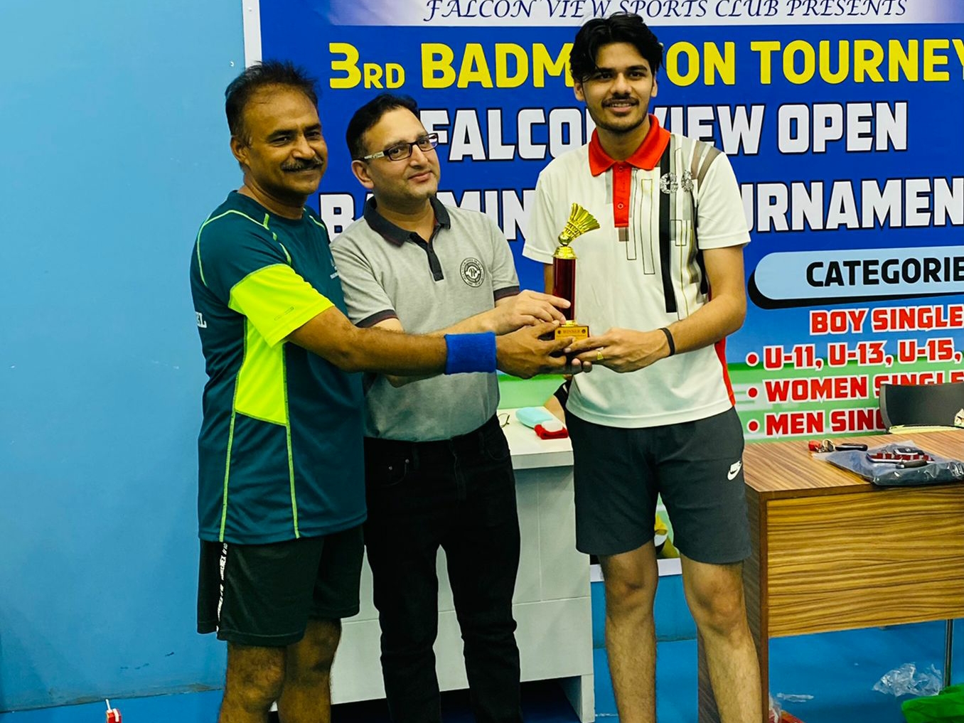 National player Anshul Jain secured first position, honored with trophy ...