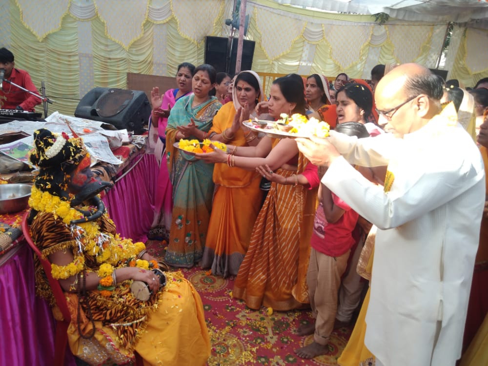 The tableau, decorated as Lord Ardhanareshwar, is the cause of ...
