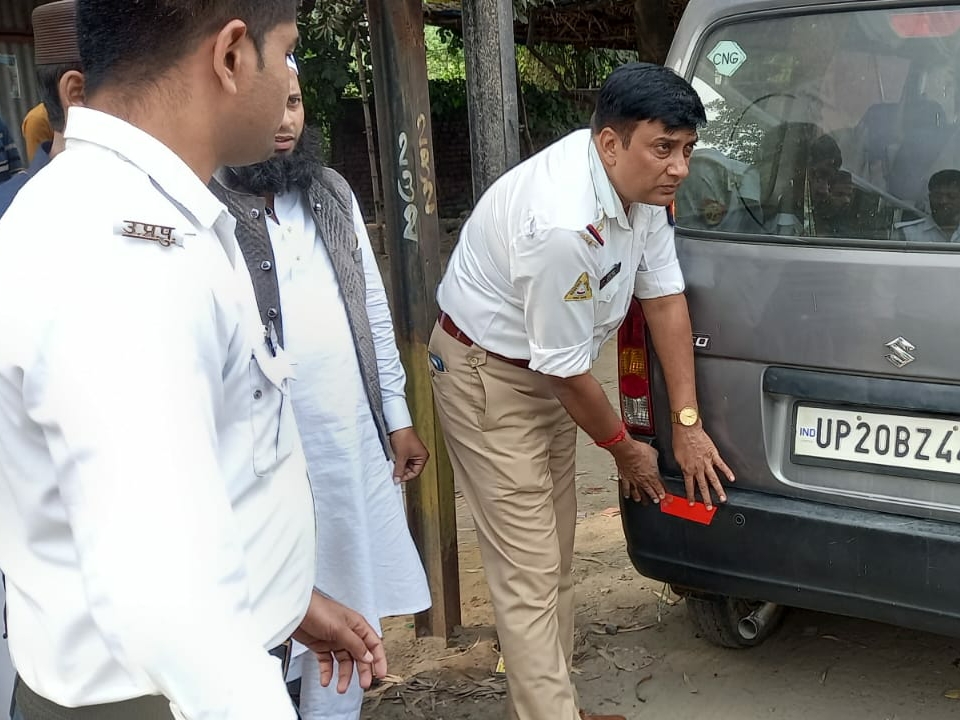 Traffic police pasted radium stickers on the vehicles of devotees ...