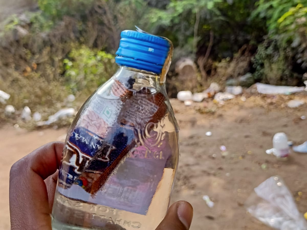 Gutkha pouch found after dead snake and frog in deshi liquor bottle in ...