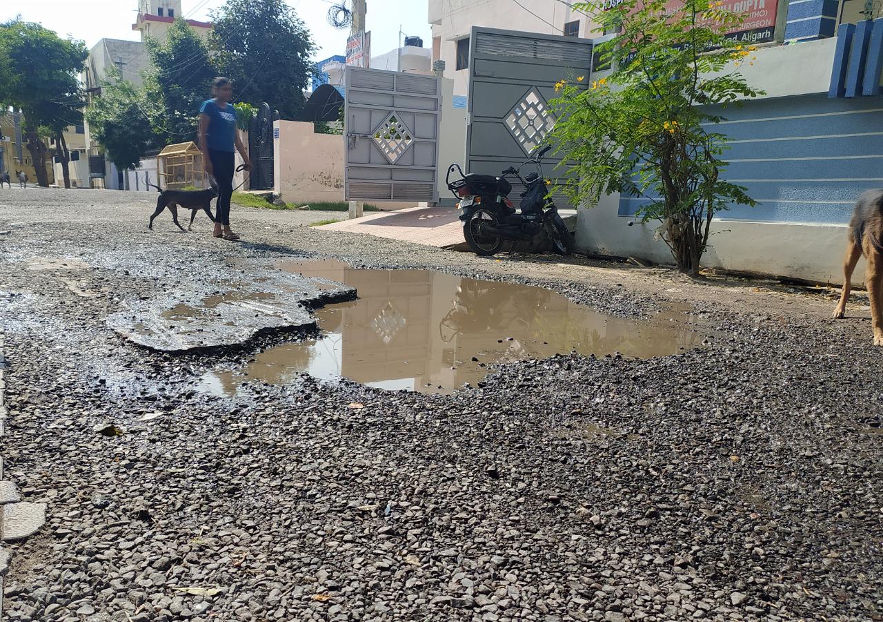 2828 kms in Aligarh Division. The road was to be potholed free, only ...