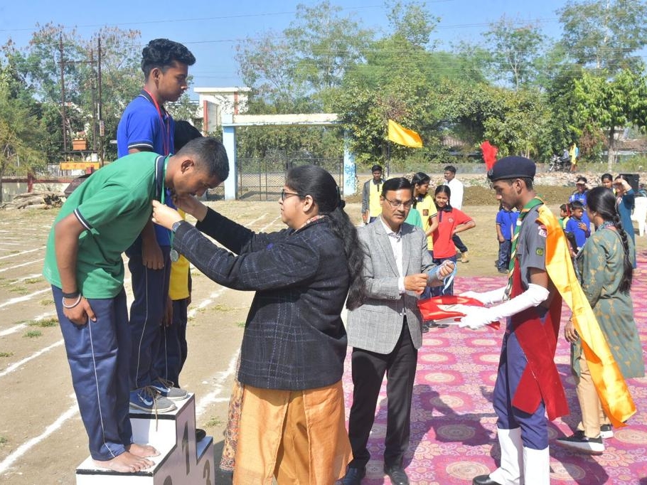 The Collector hoisted the flag and lit the torch; Promising honored ...