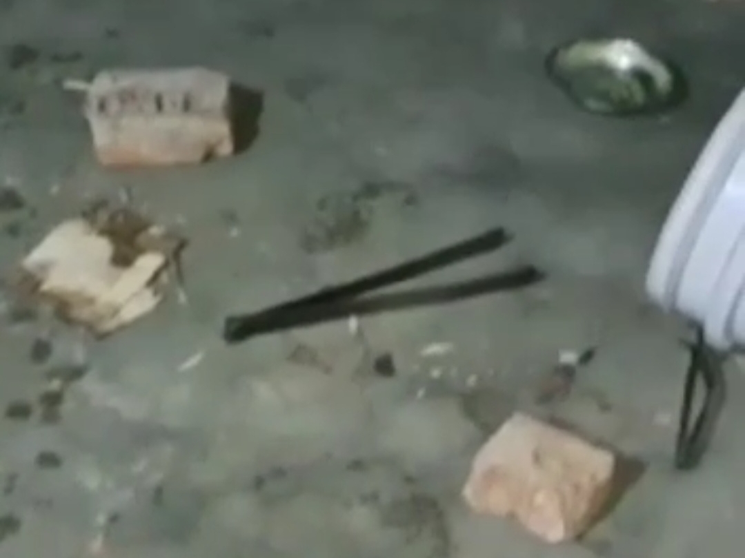 Women were heating fire, father-son injured after stone pelting ...