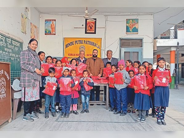 Sweaters presented to 50 girl students in Hindu Putri Pathshala School ...
