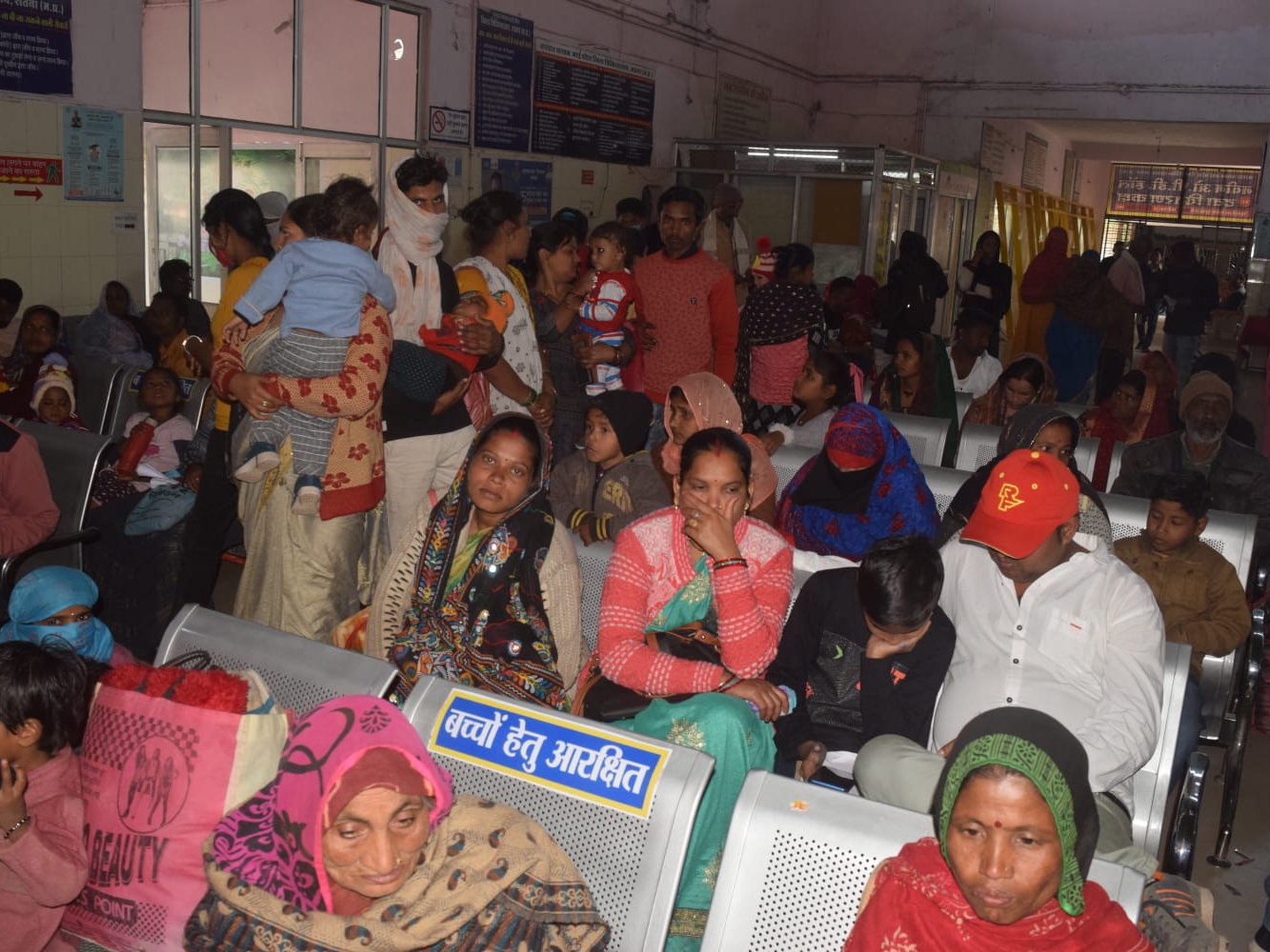 The line kept on in the OPD of the district hospital, the patients kept ...