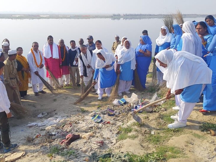 Cleanliness of Ganga Ghats done by the women and men present, people ...