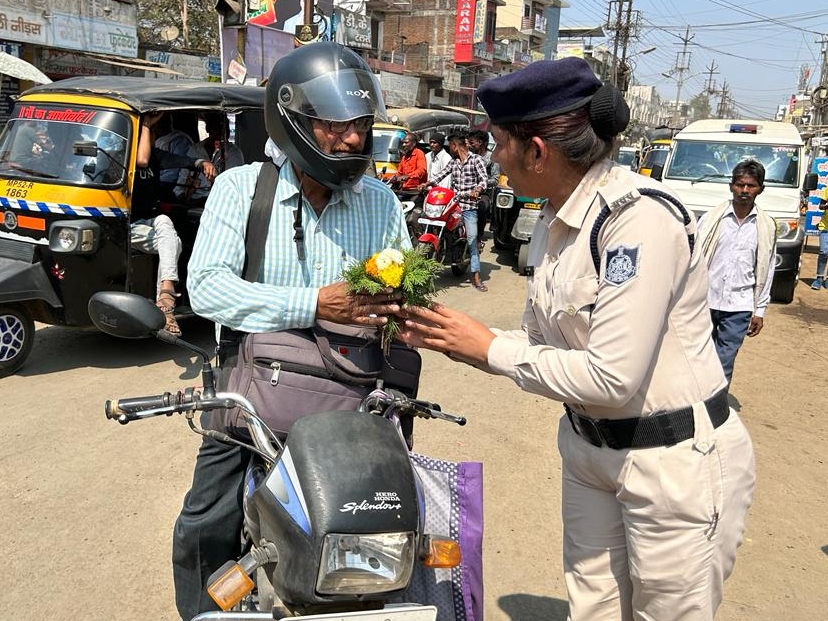 Traffic control done by standing at crossroads, message of awareness ...