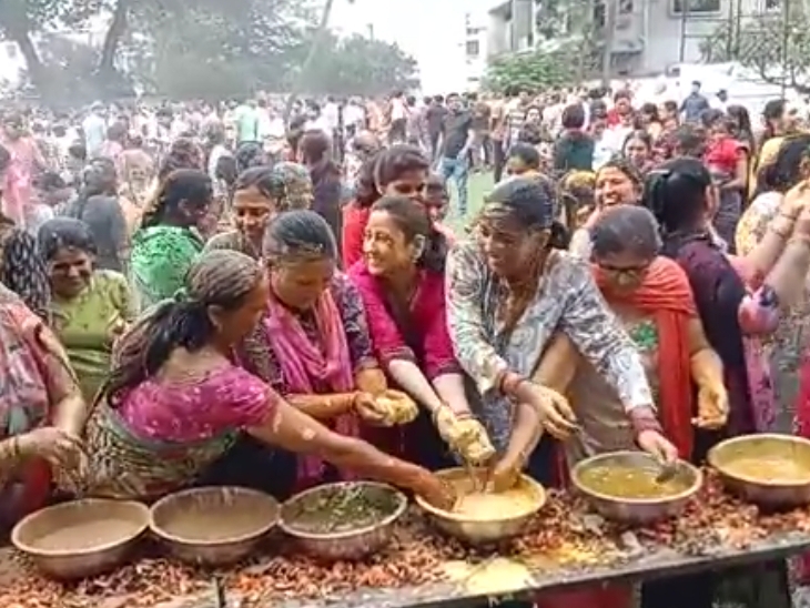People from the city and village in the Shri Krishna Mangal complex ...