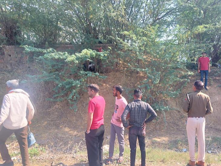 Body stuck between tree and wall near railway line, police engaged in ...