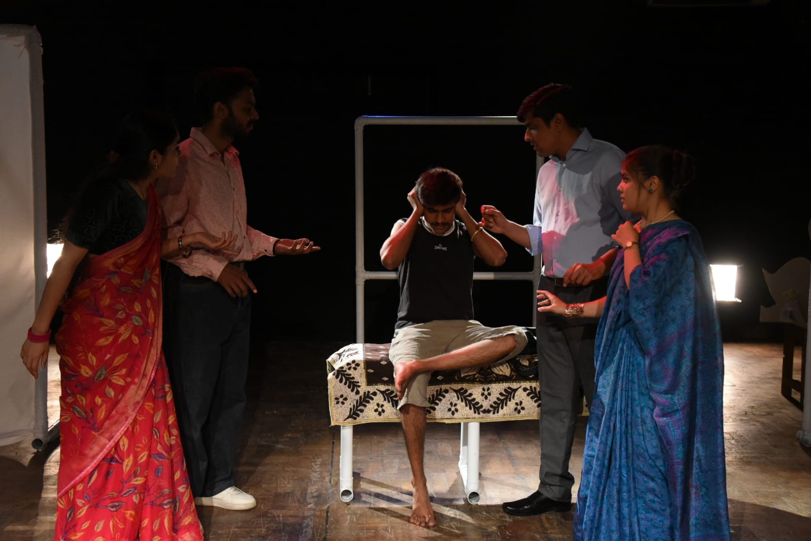 Staging of the play Nek Chor showing the picture of the alleged ...