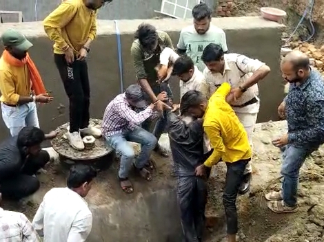 Laborer pressed due to collapse of tank wall, pulled out after hard ...