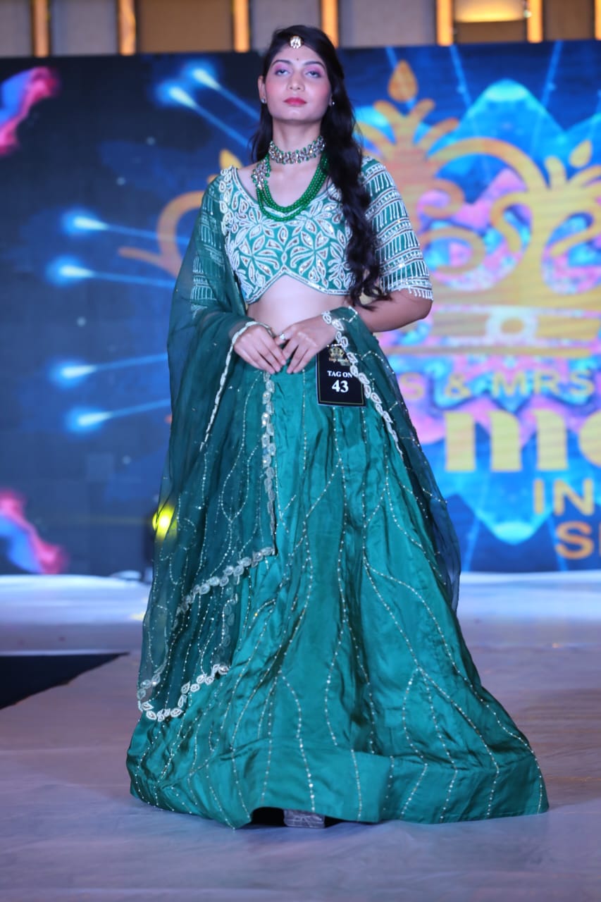 Models seen in bridal, cocktail and western partywear dresses in Miss ...