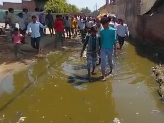 Knee-deep dirty water on the road, case of Sunwar Sarai village of ...