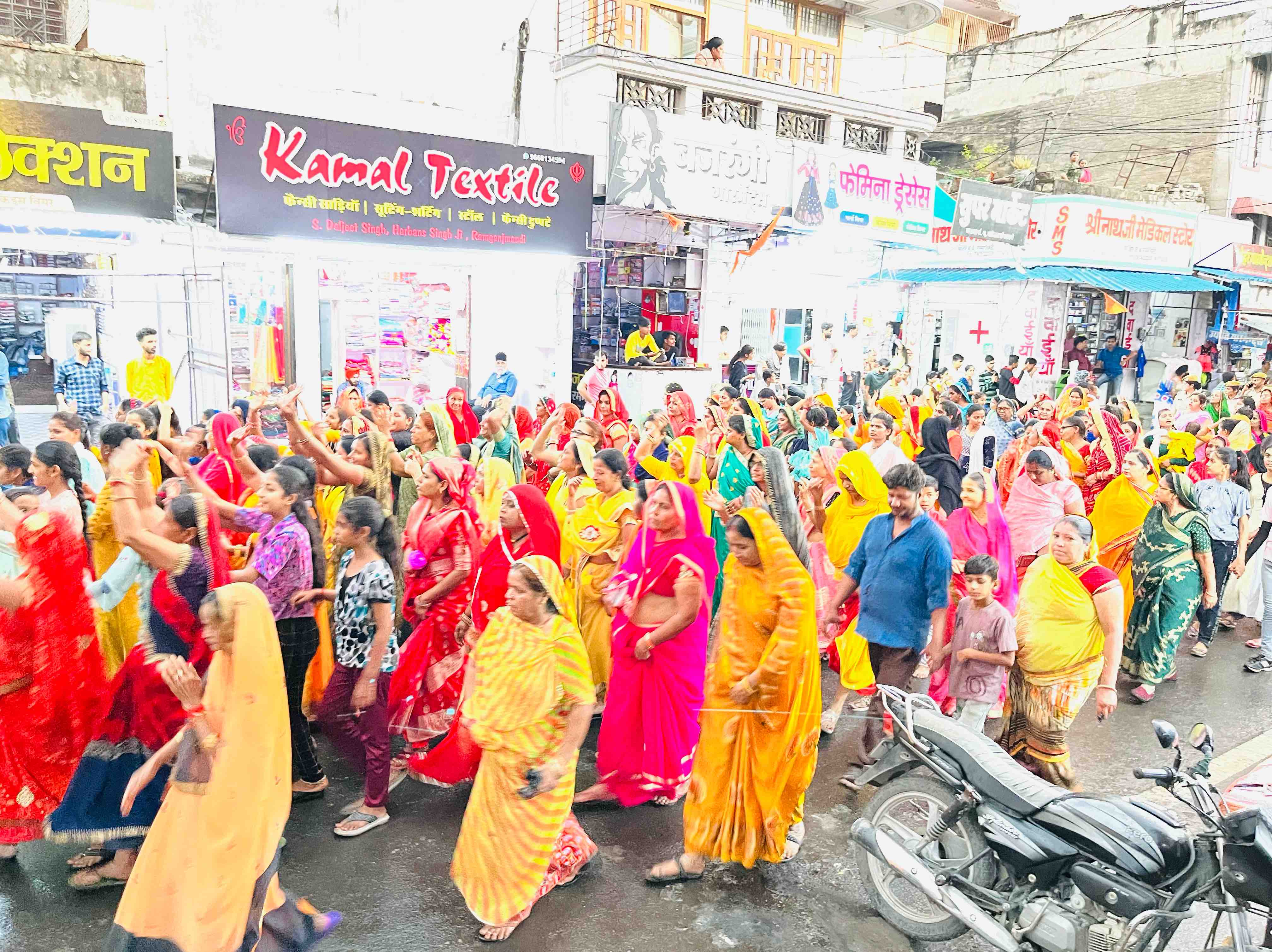 : Devotees swing fiercely in the procession amidst the rain, 70 idols ...