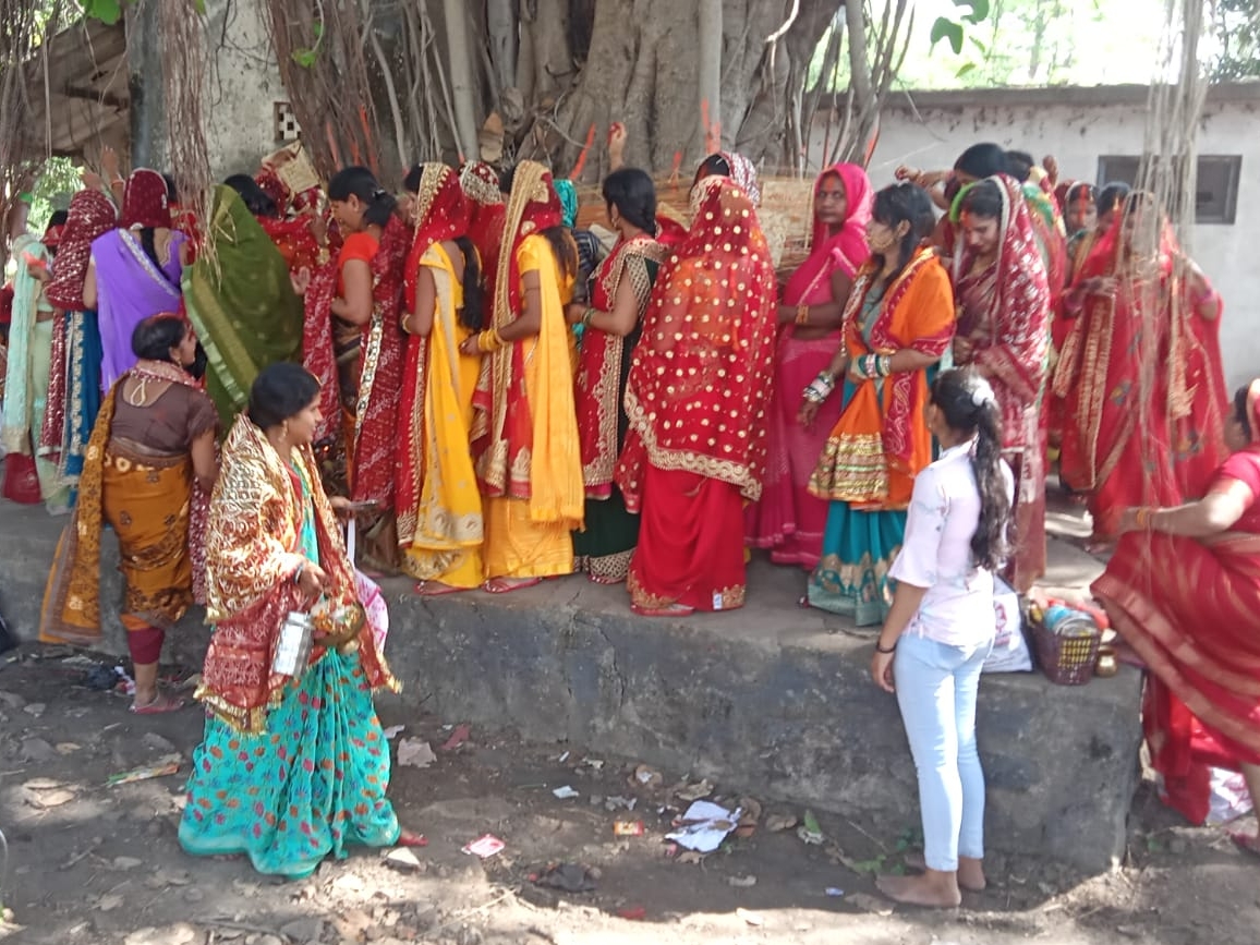 Thousands of women circumambulated the banyan tree and worshiped it ...