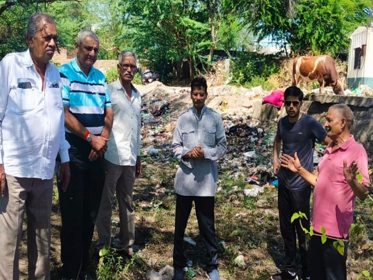 Akodara's clean water is flowing in a pile of dirt and debris on the ...