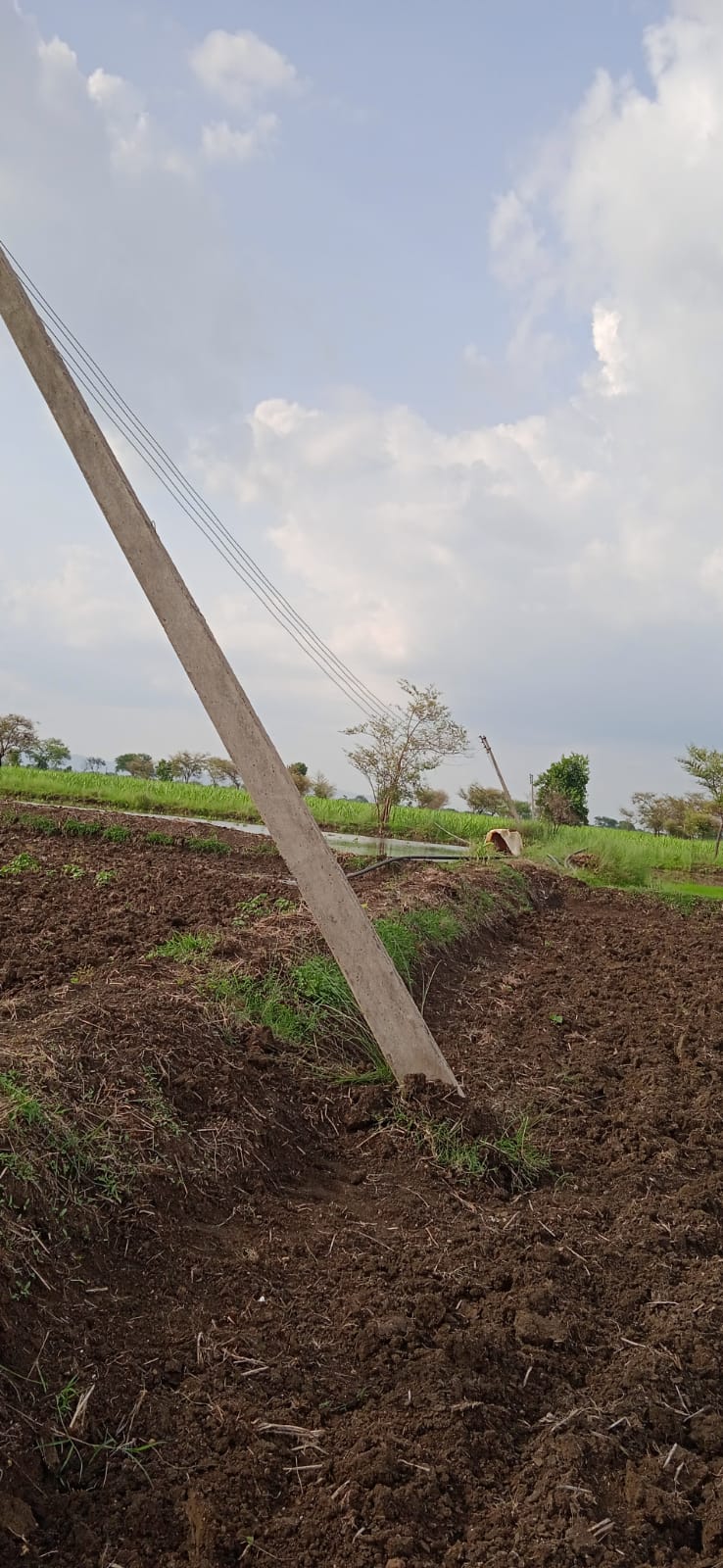 Poles bent, power line height low, danger of current