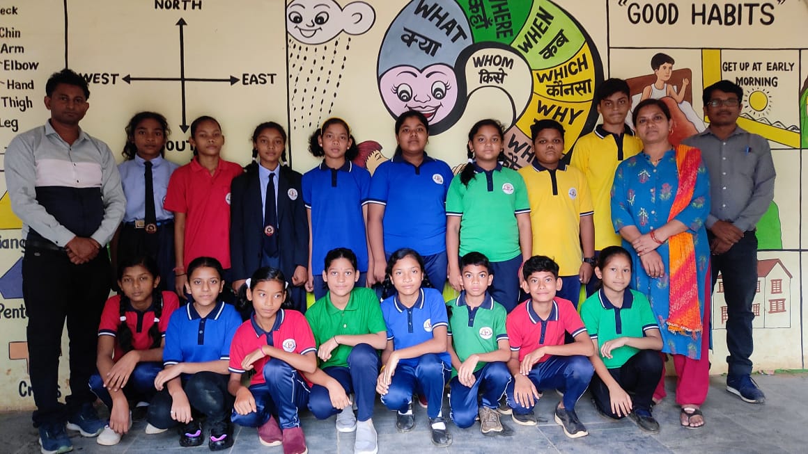 Karan Singh topper in calligraphy competition and Bina topper in ...