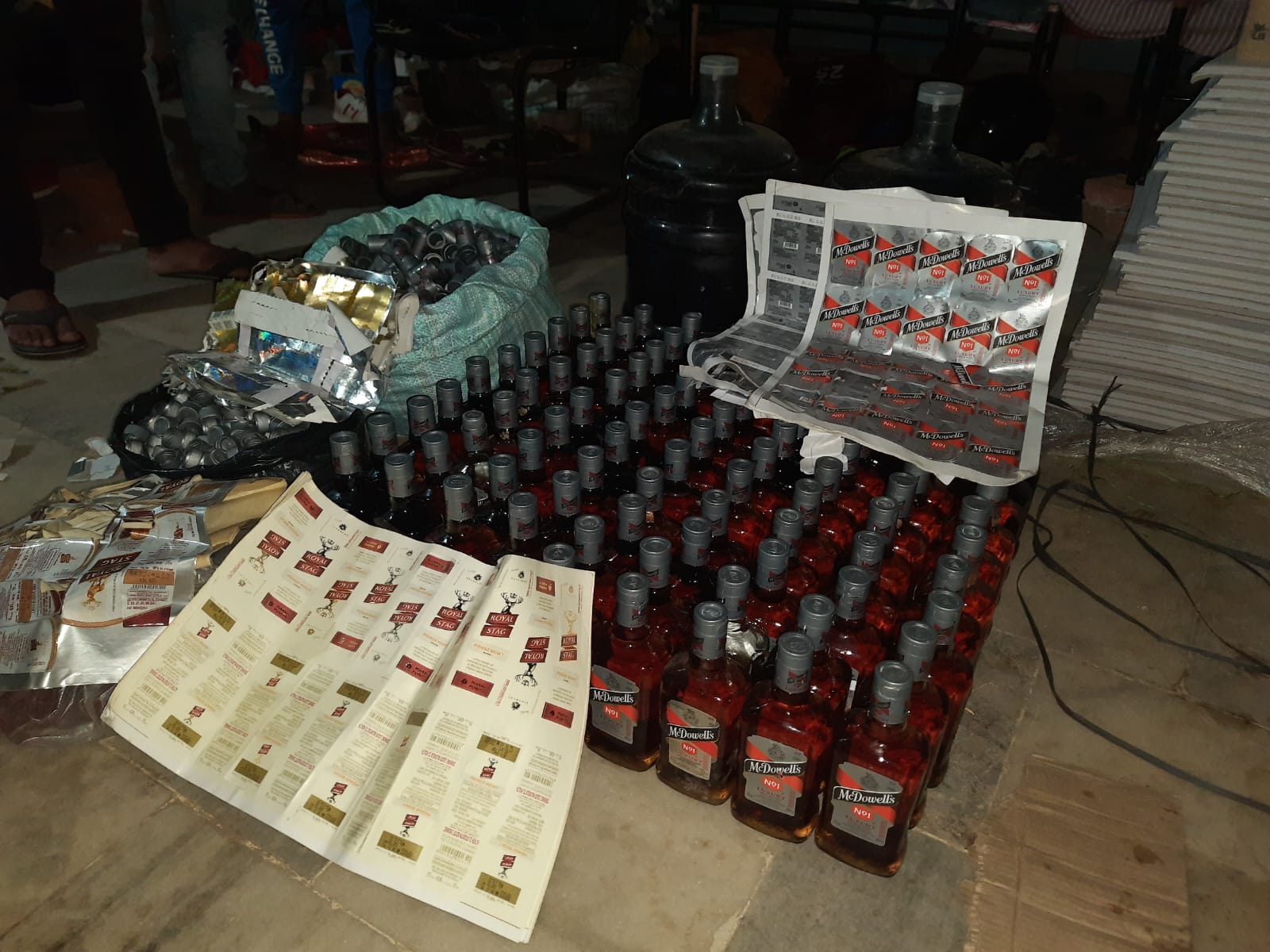 Raid in Chitua, seized fake liquor sticker and hologram | चिटुआ में ...