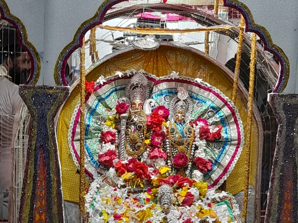 Banke Bihari sitting on the swing in Malhargarh: On Hariyali Teej, wear ...