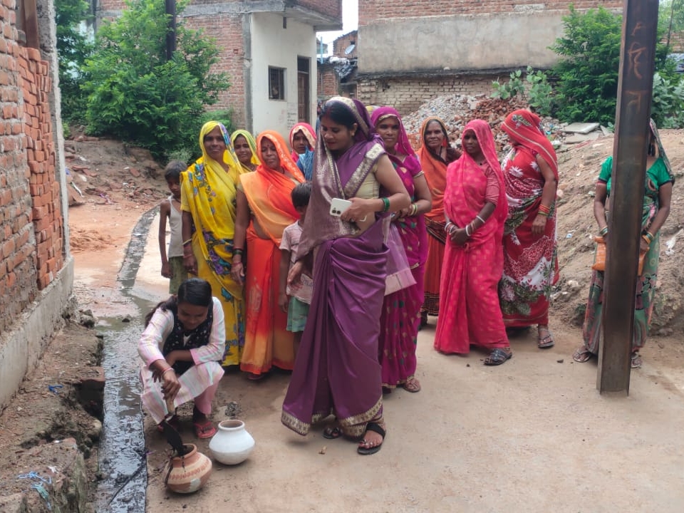 The residents of the ward filled the dirty water of the drain in the ...