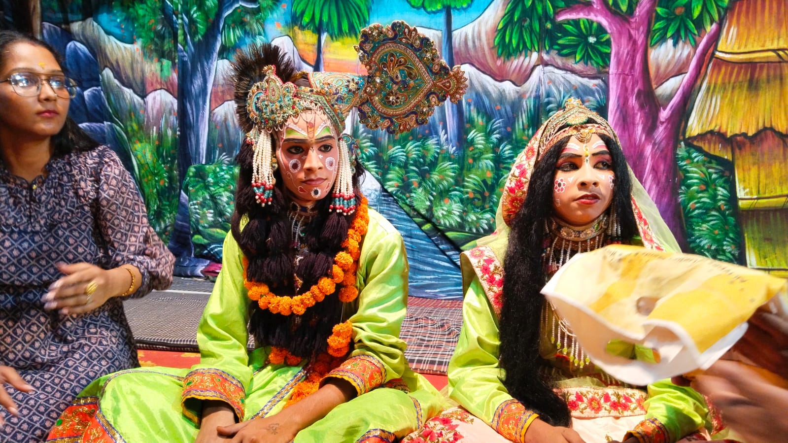 Devotees showered flowers in the pandal on the occasion of marriage of ...
