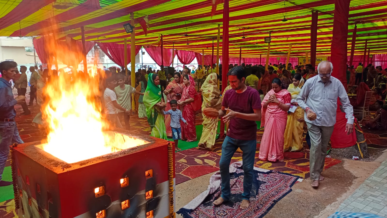 On the last day of Bhadwa fair, devotees put quinces in the fire pit ...