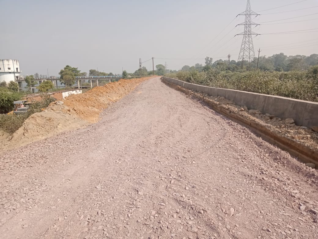 Construction work of canal road connecting pump house to Gerwaghat ...