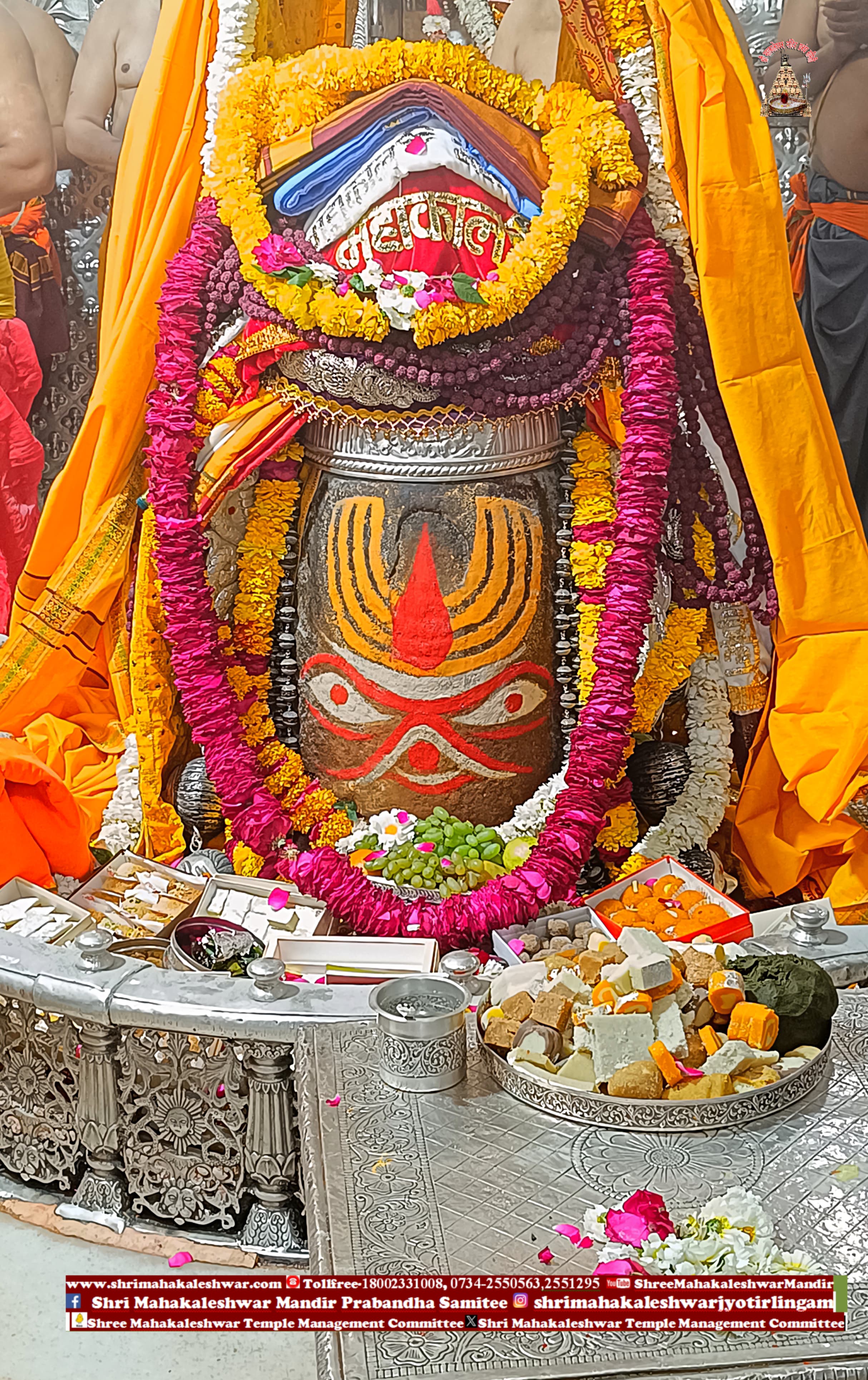 Shringar of Baba Mahakal by offering flower cloth and sandalwood ...