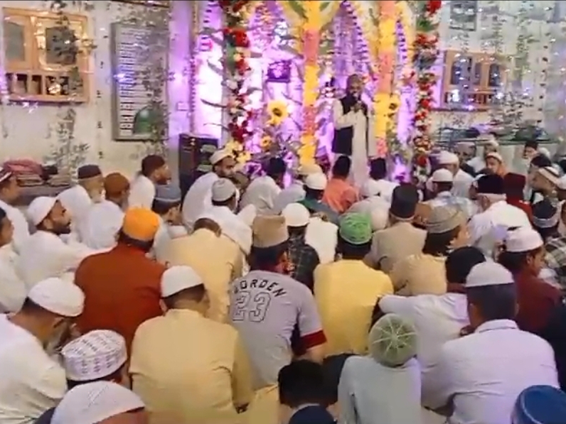 The mosque lit up with lights after the completion of the Holy Quran in ...