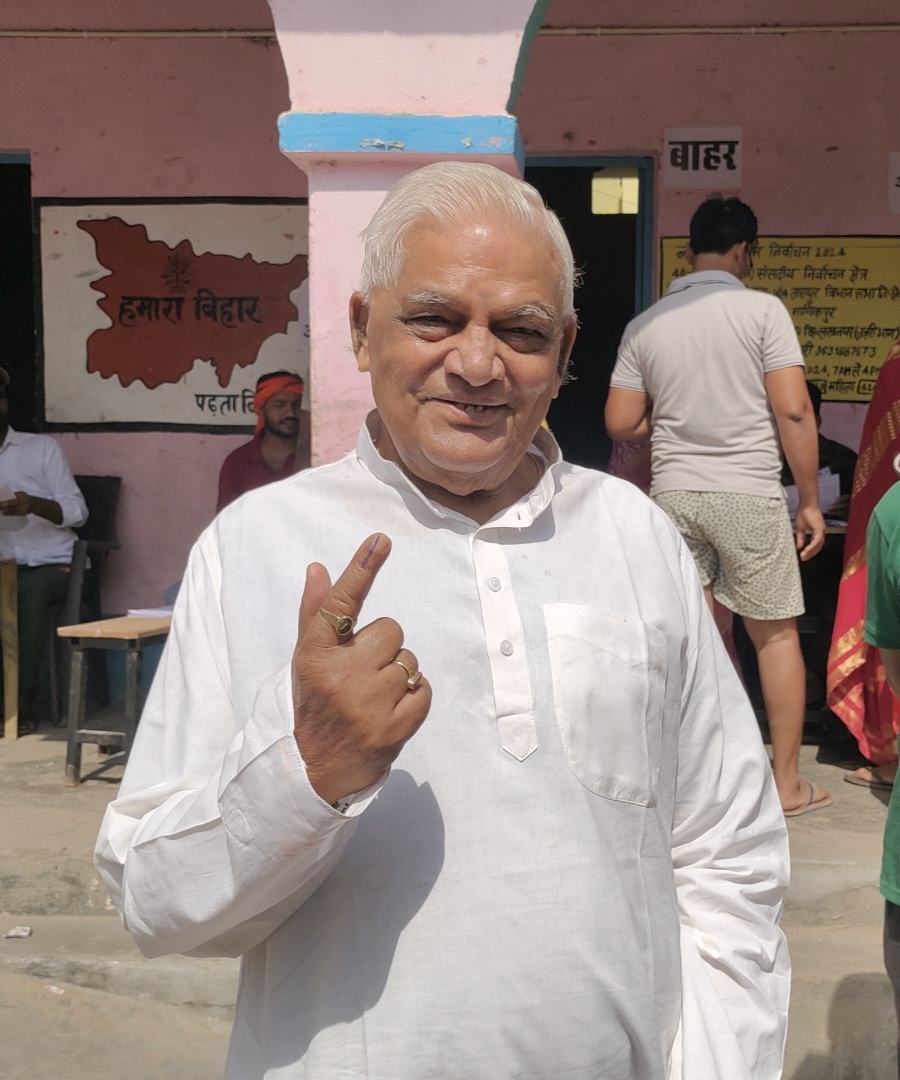 Former minister Shakuni Chaudhary cast his vote at one booth while ...