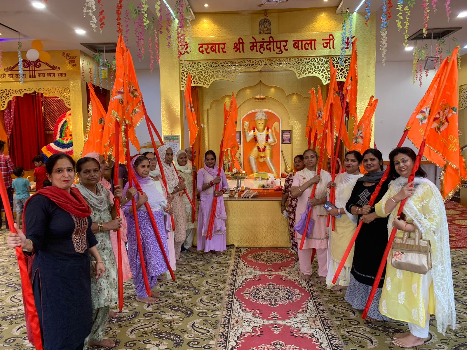 Shri Balaji Trust distributed flags to the devotees participating in ...