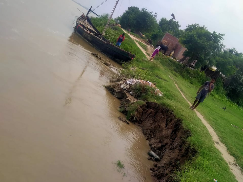 The fierce form of the Saryu river in Ballia, Two people's houses ...