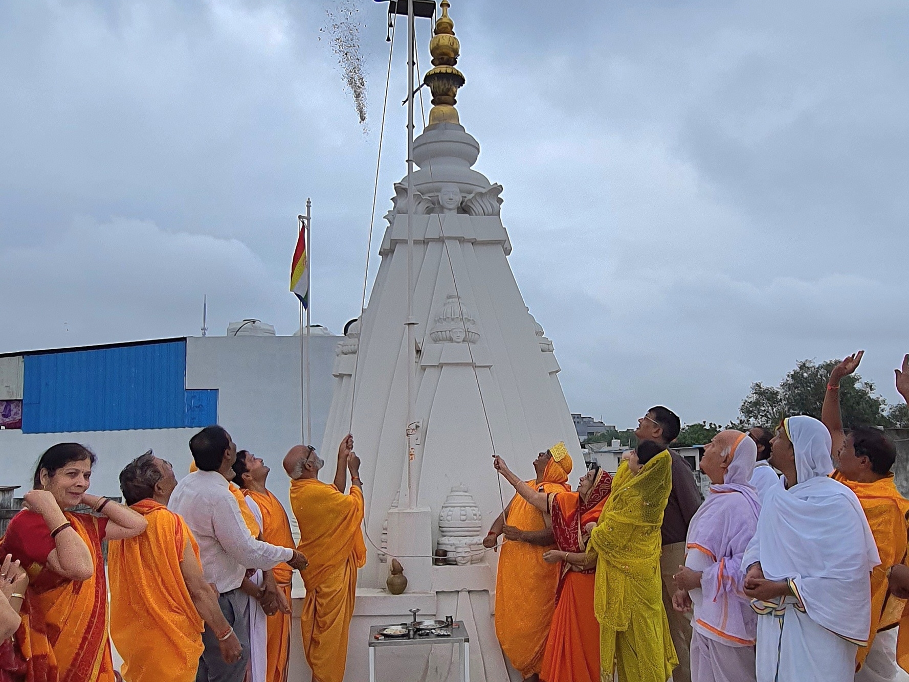 A new flag was hoisted on the top of the Jain temple