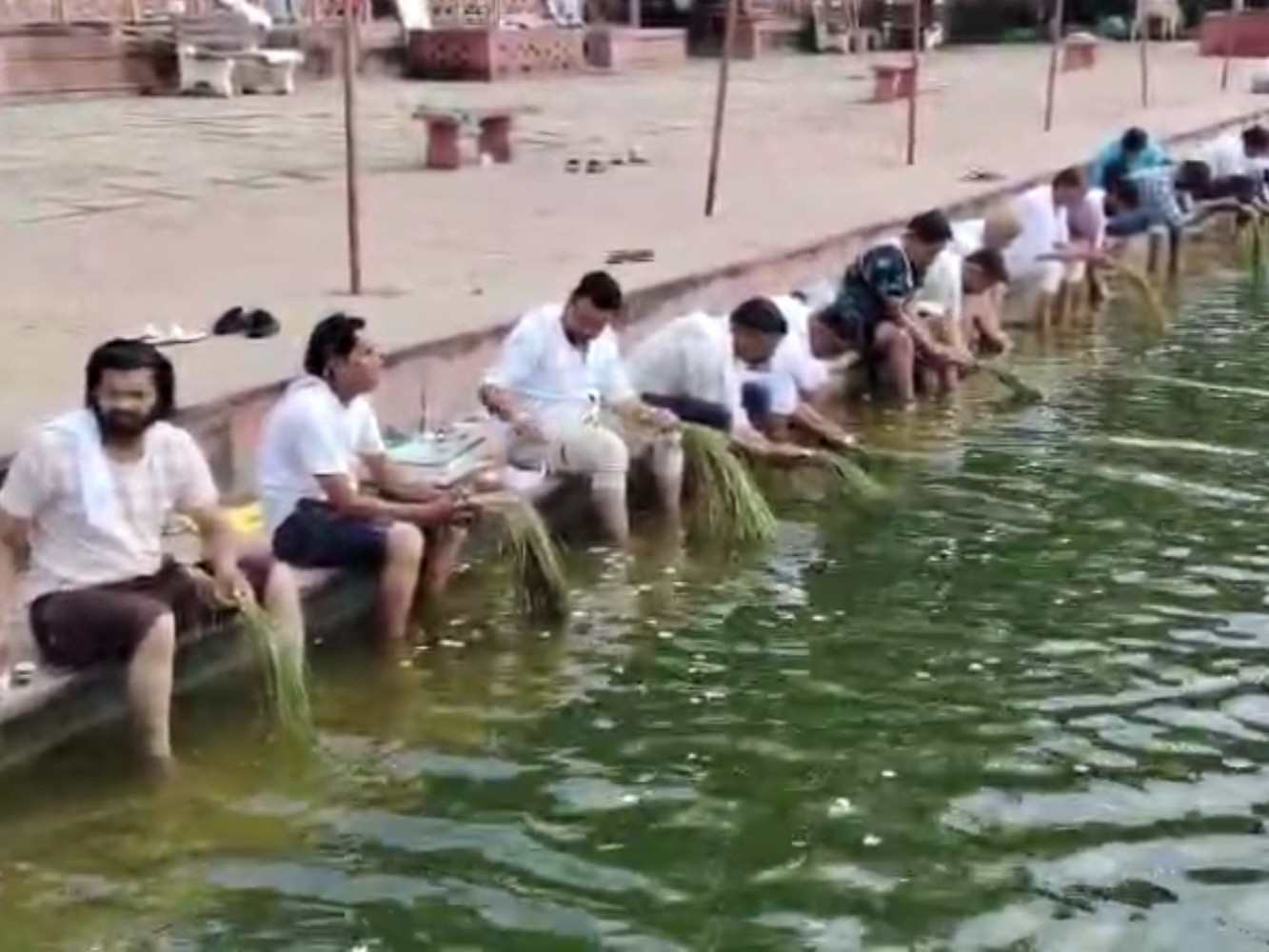 People offering prayers to their ancestors in Sagar Lake
