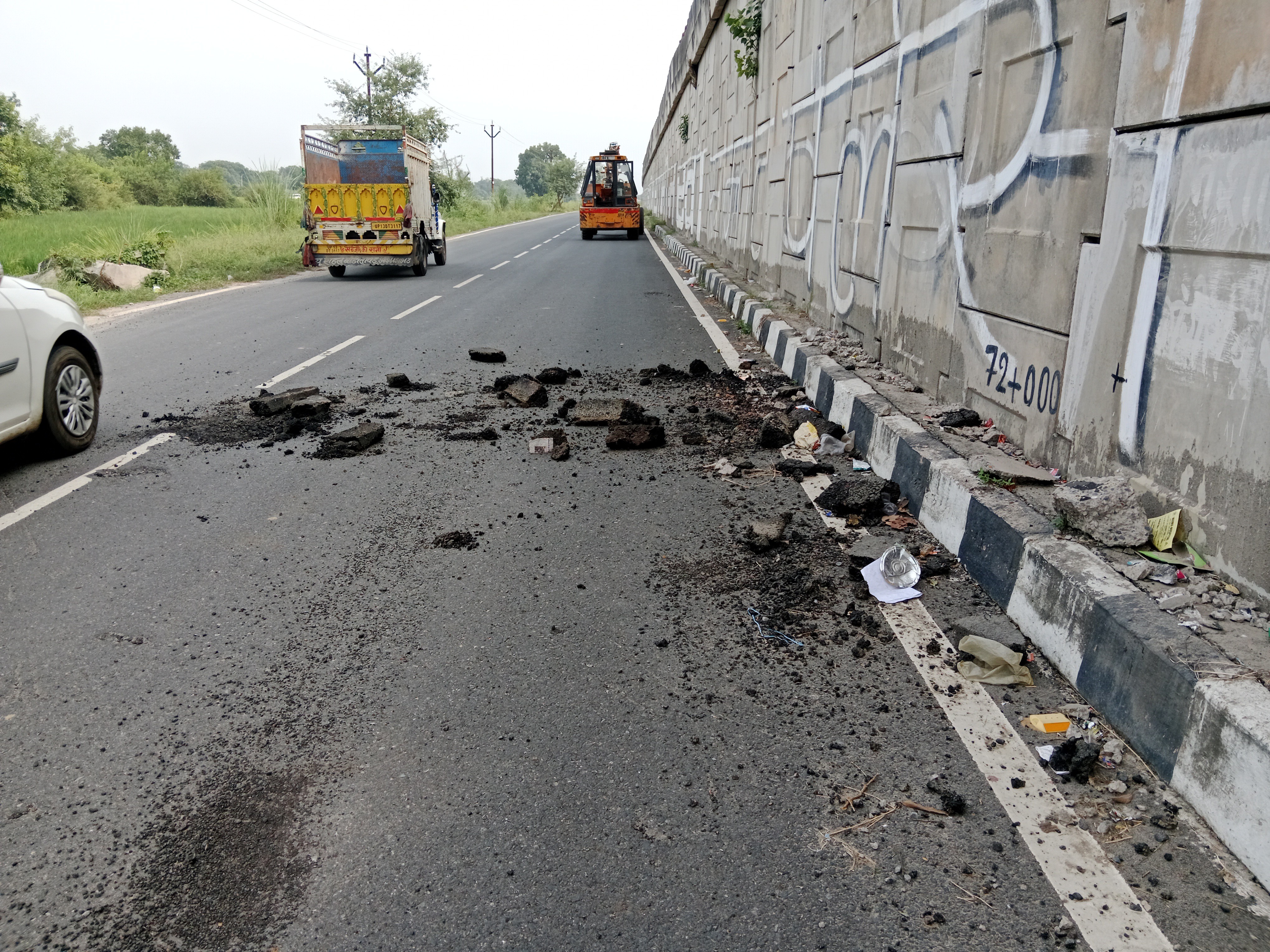 A small part of the wall of the flyover on Bulandshahr-Delhi highway ...