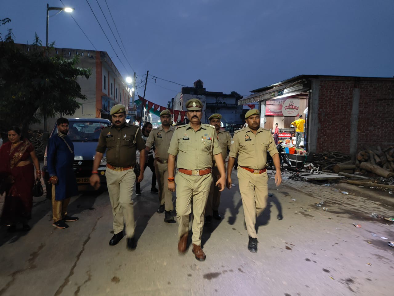 Bakewar police station chief patrolled Lakhna market on foot.