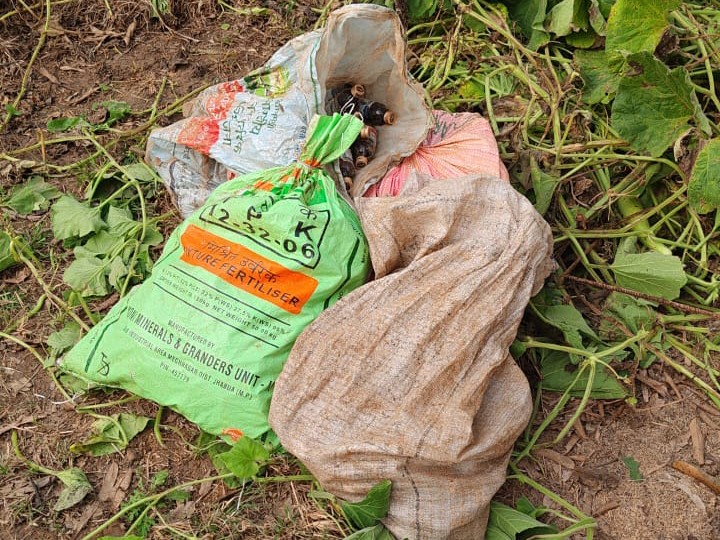 A consignment of cough syrup was hidden in a pile of sand