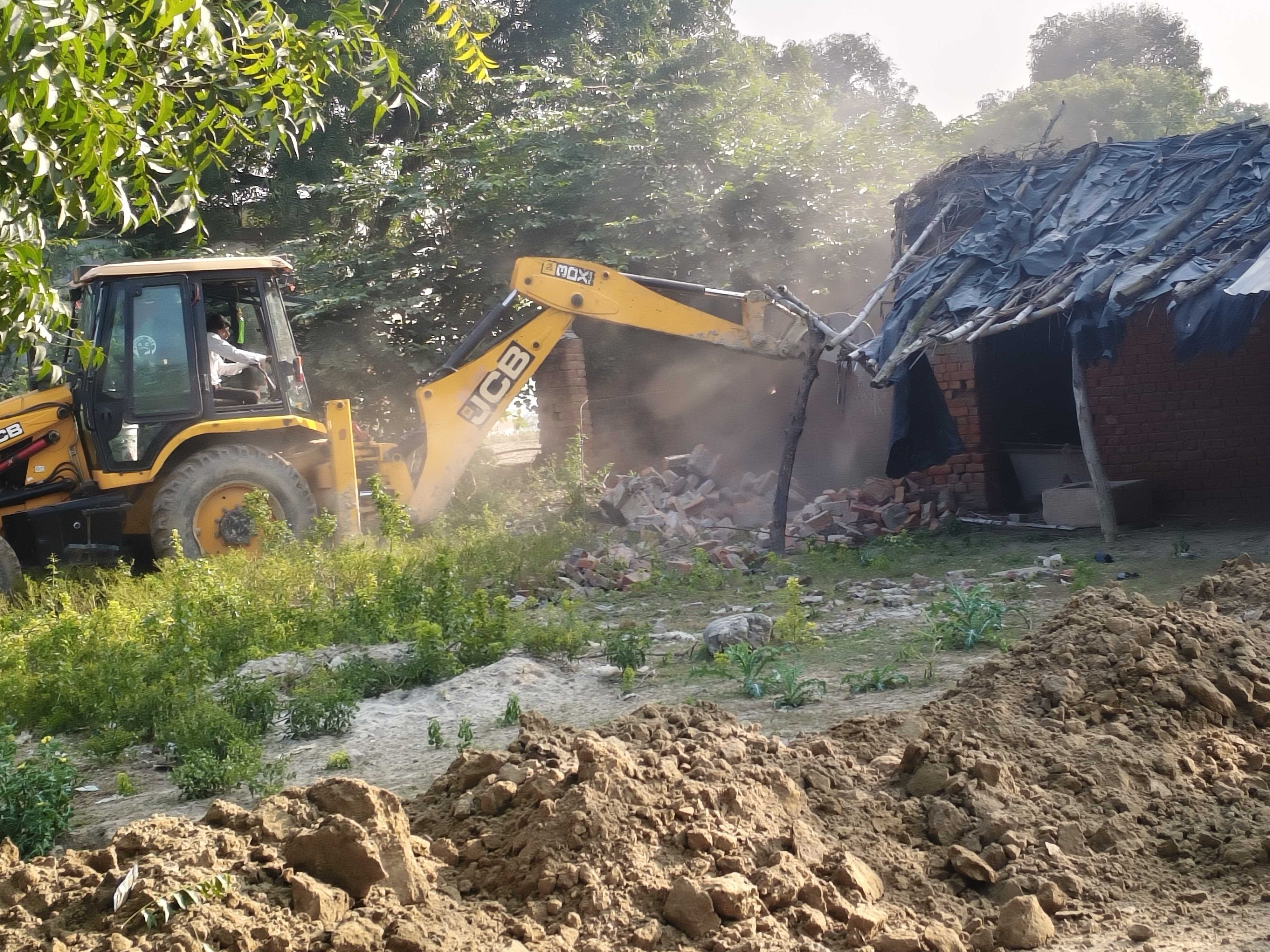 Illegal occupation removed from playground land in Madhoganj